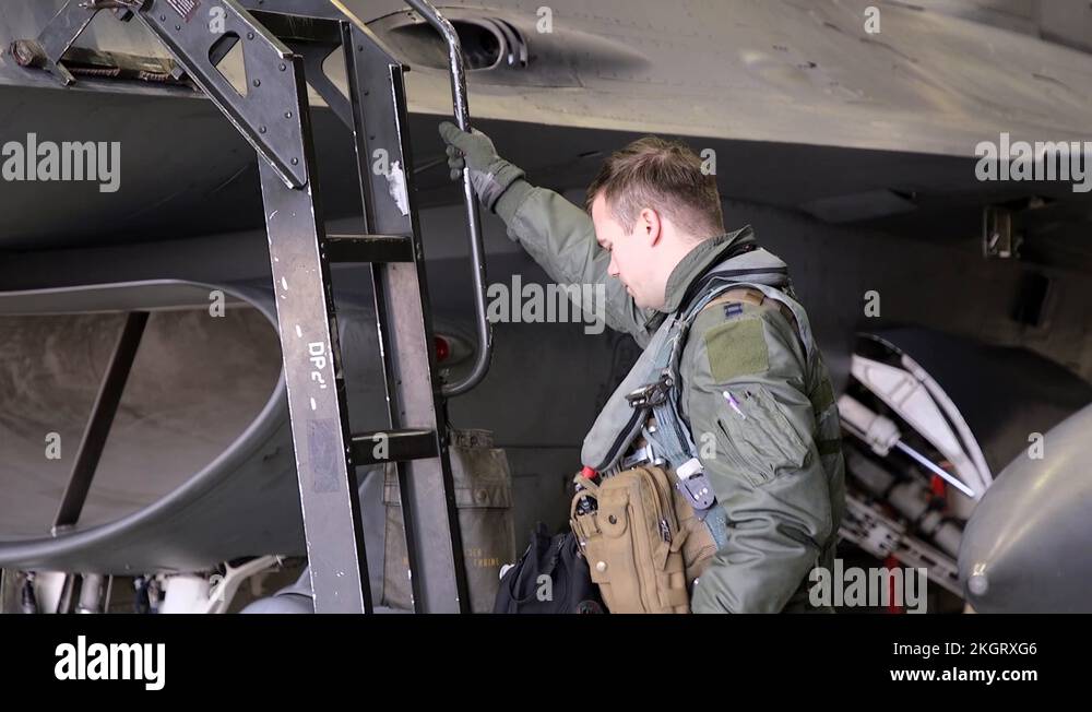 F-16 Fighting Falcon pilot climbing cockpit ladder Stock Video Footage ...