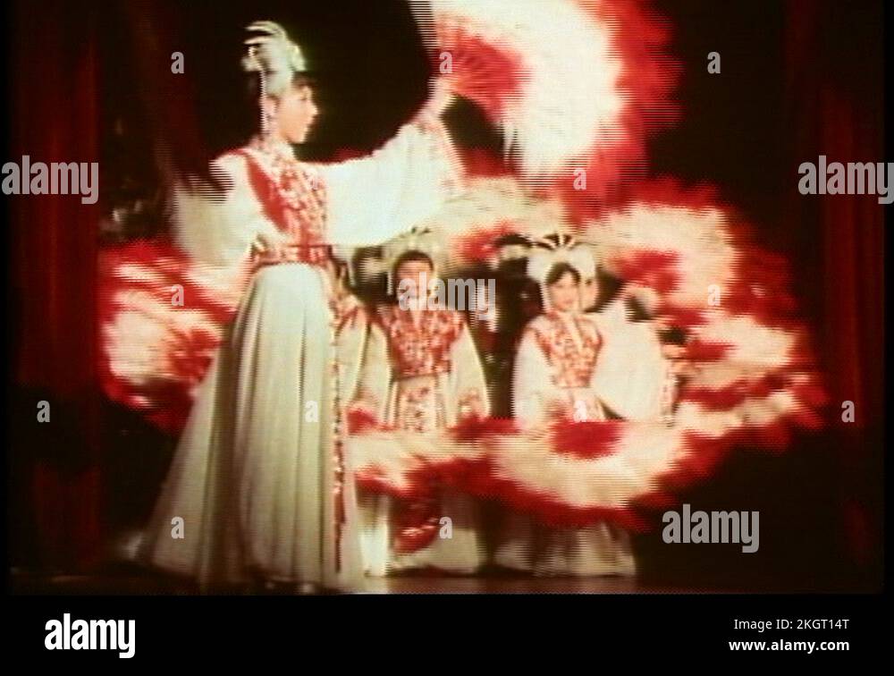 HONG KONG, CHINA, 1982, Hong Kong cultural show, dancers with red and ...