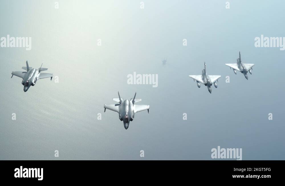 U.S. F-35A Lightning II's fly in formation with Qatari Dassault Mirage ...