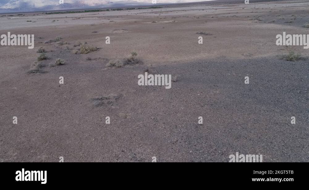 Death Valley Ground. Consisting of soil, rocks, sand and grass. 4k ...