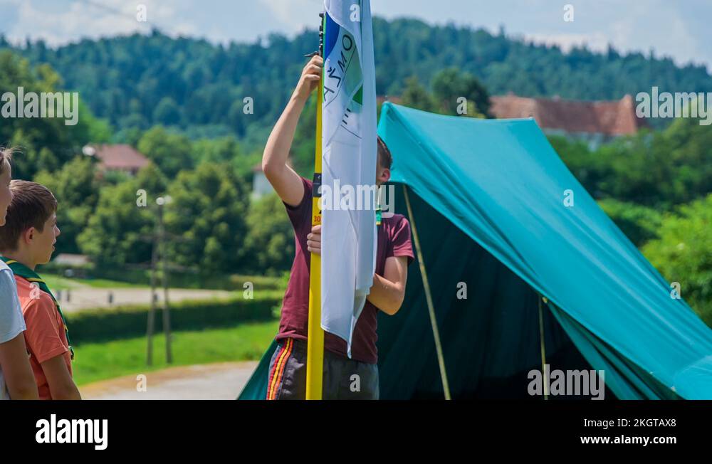 Lifting a scout flag really high up in the sky Stock Video Footage - Alamy