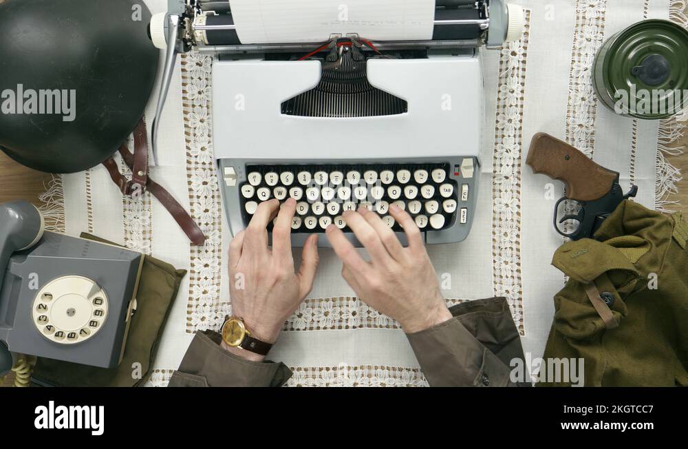 WWII Vintage Soldier Typing Letter on Typewriter Top View Desk Stock ...
