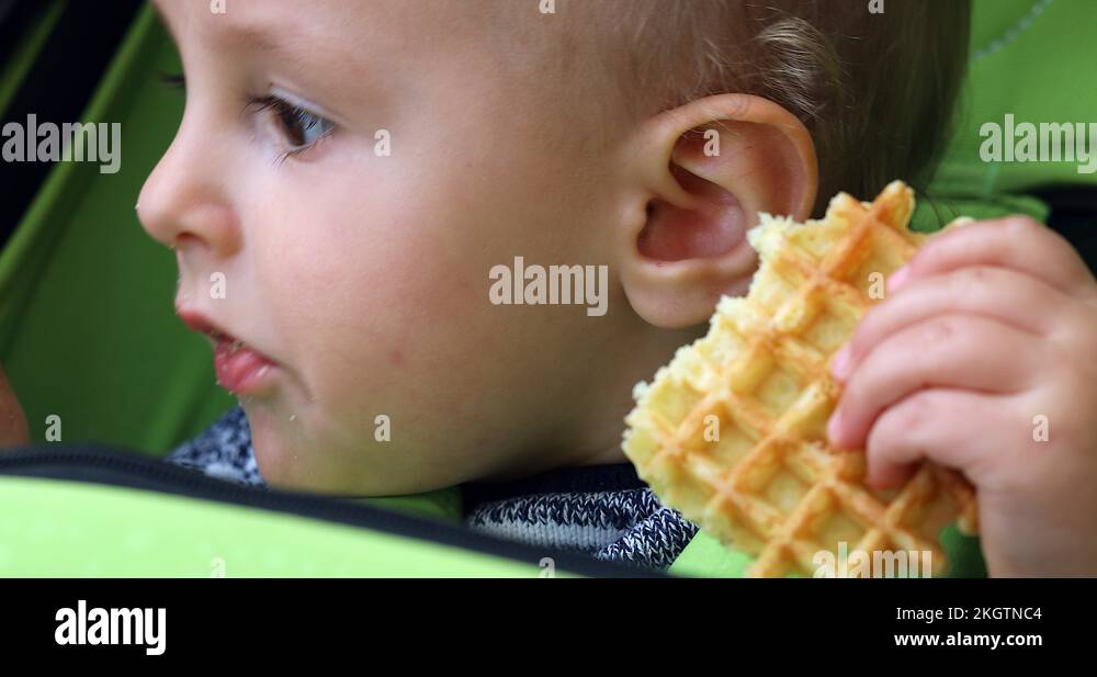 Baby with waffle Stock Videos & Footage - HD and 4K Video Clips - Alamy