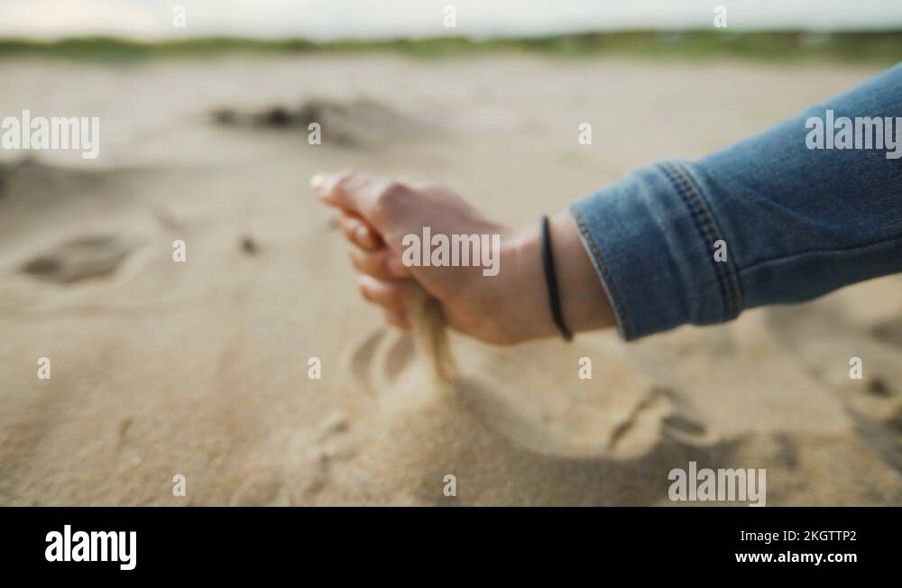 Hand pouring sand Stock Videos & Footage - HD and 4K Video Clips - Alamy