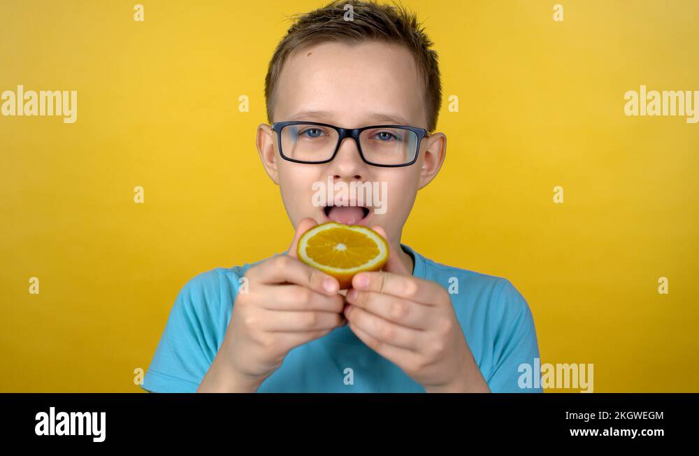 Boy biting fruit Stock Videos & Footage - HD and 4K Video Clips - Alamy