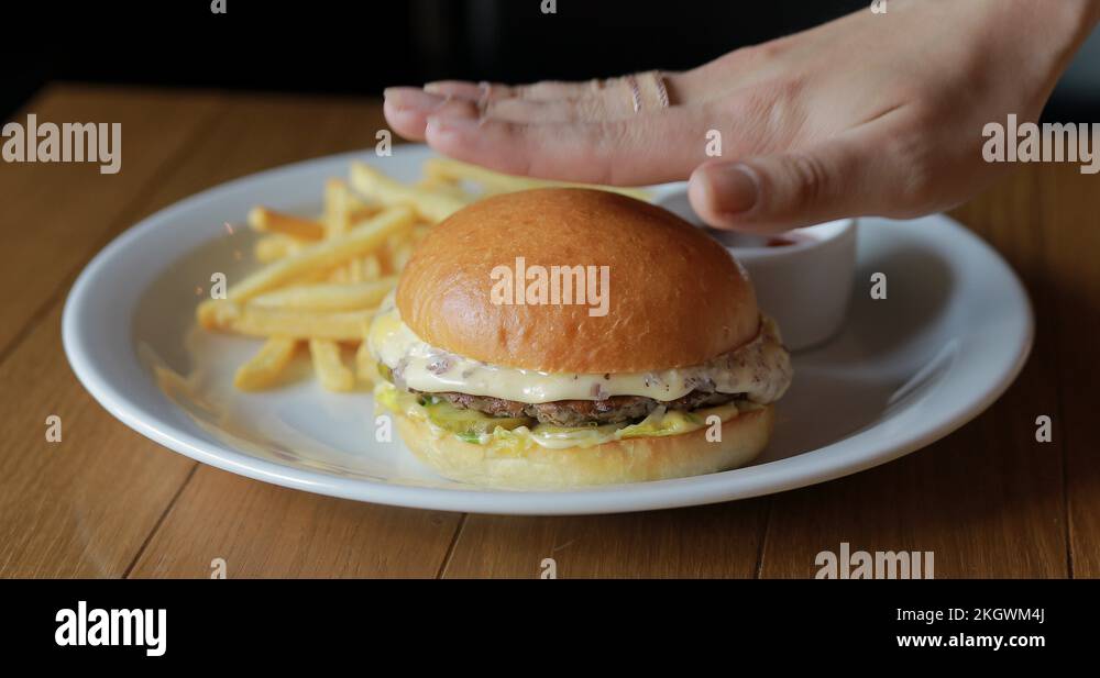 Burger hand Stock Videos & Footage - HD and 4K Video Clips - Alamy