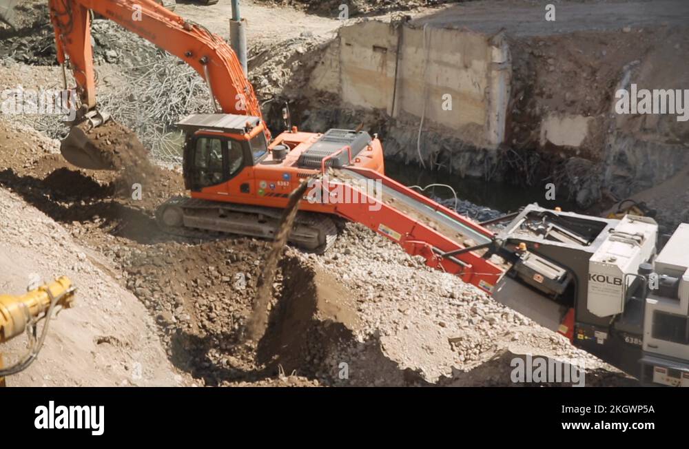 Excavator and Sifting Machine Working at Construction Site Stock Video ...