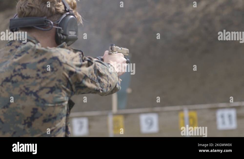 Soldier firing pistol at targets in shooting range Stock Video Footage ...