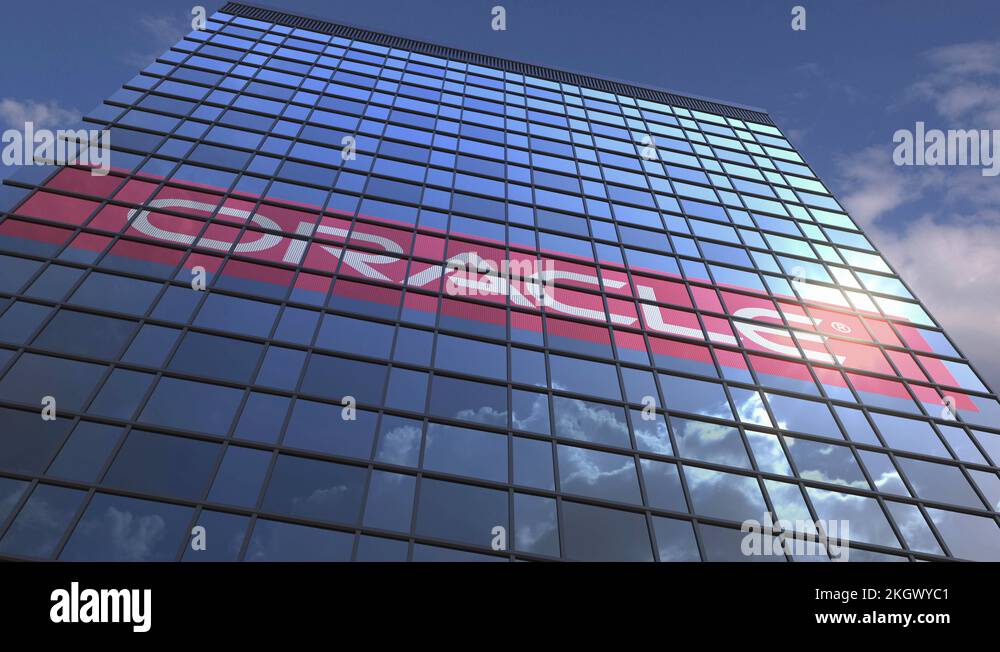 Logo of ORACLE on a media facade with reflecting cloudy sky, editorial ...