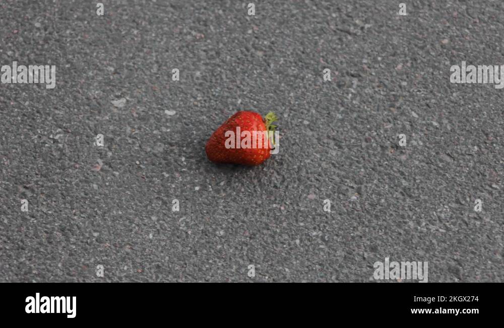 strawberries asphalt background fruit food Stock Video Footage - Alamy