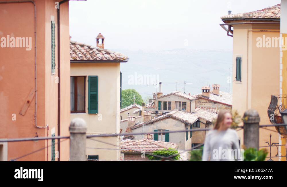 two women come and sits on the bench. Cameras coming down from the top ...