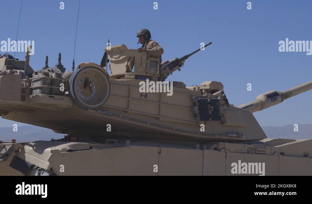 M1a1 Abrams Tank Commander Looking Out Of Turret While Travelling Stock