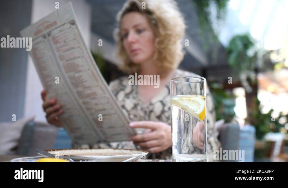 Restaurant menu holding Stock Videos & Footage - HD and 4K Video Clips ...