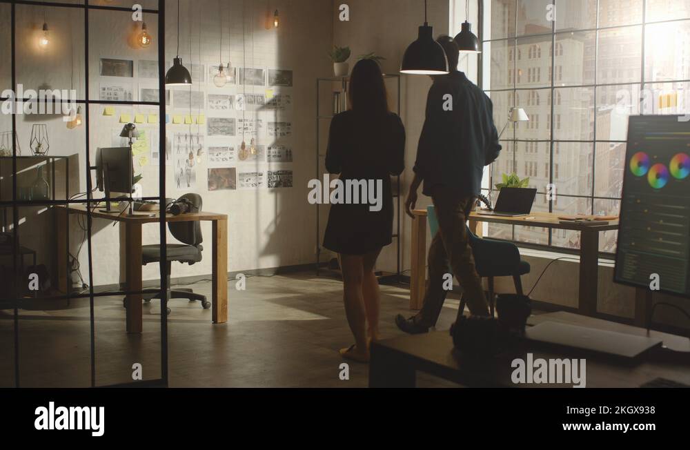 Young Creative Male and Female are Organizing a Storyboard on an Office ...