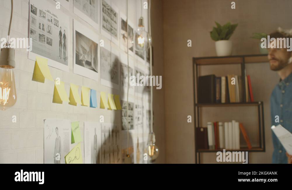 Young Creative Male and Female are Organizing a Storyboard on an Office ...