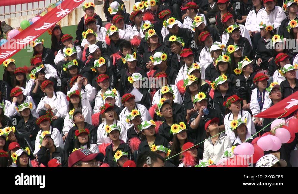 Crowd of students during sports event at university campus in China ...