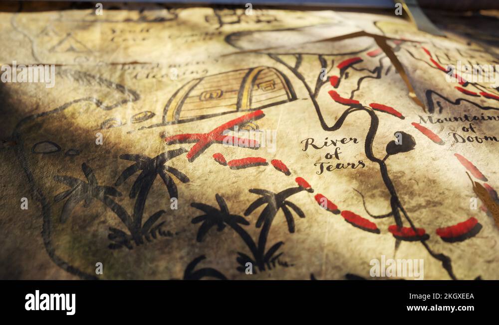 Old, worn handmade treasure map on tropical beach sand near the dig ...