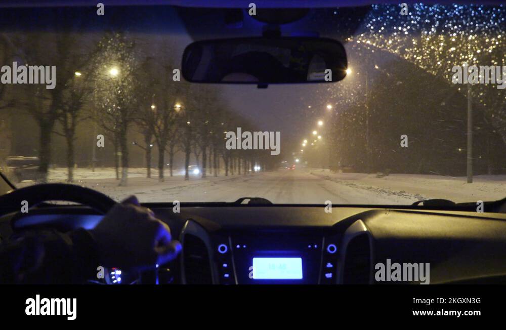 driving in a car in the night city in winter. view from the cab Stock ...