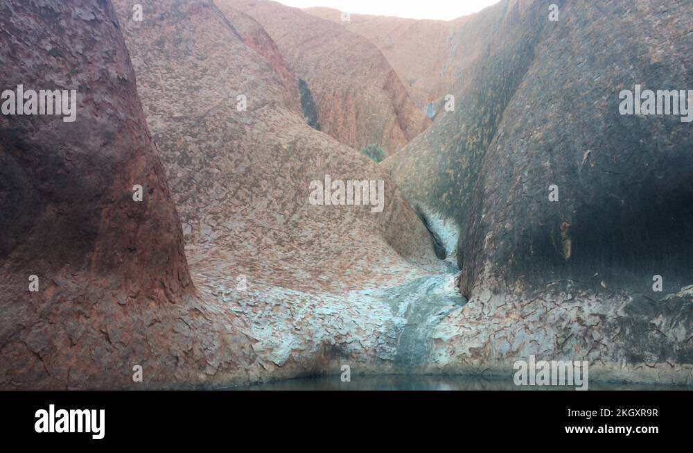 Water hole in Uluru Ayers Rock in Uluru-Kata Tjuta National Park ...