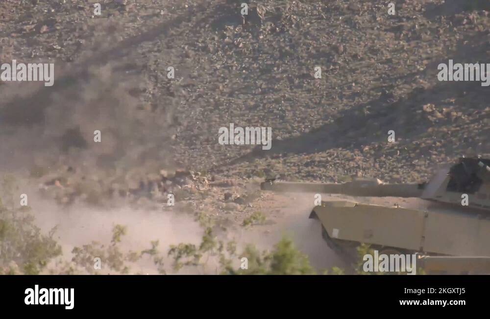 M1A2 Abrams battle tank firing cannon during live fire exercise in ...