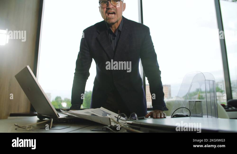 angry boss screaming and waving his arms mad at the office Stock Video ...