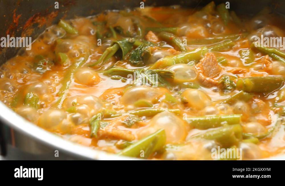 Cooking pork curry with water spinach, Thai famous food Stock Video ...