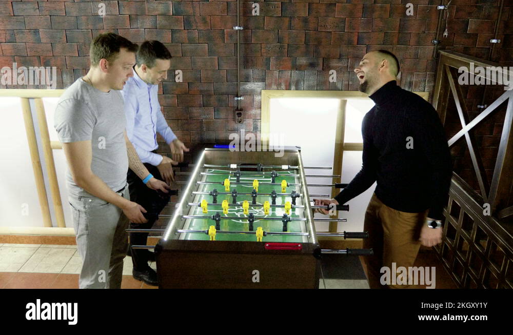 Three men at a table Stock Videos & Footage - HD and 4K Video Clips - Alamy