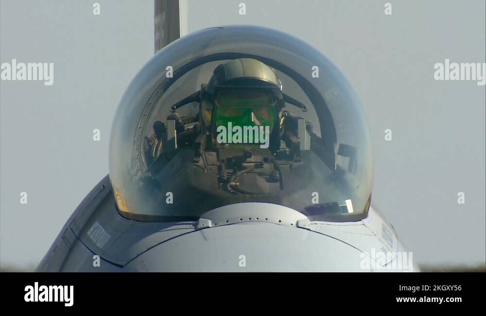 Pilot starting engine of F-16 Fighting Falcon Viper West at airport ...