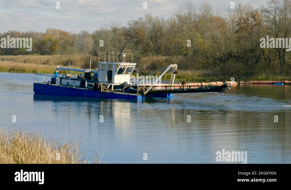 Suction dredger. Ship digging, removing mud, sand from the bottom of a ...