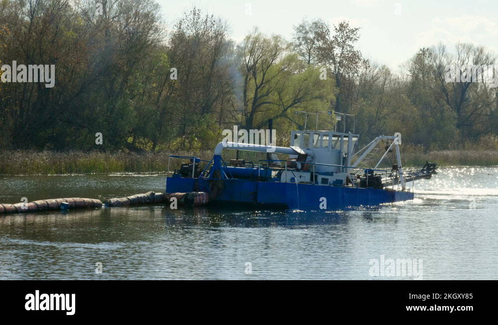 Suction dredger. Ship digging, removing mud, sand from the bottom of a ...