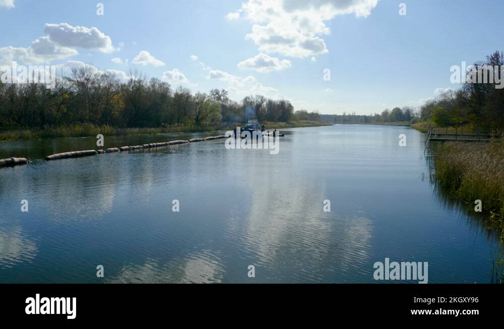 Suction dredger. Ship digging, removing mud, sand from the bottom of a ...