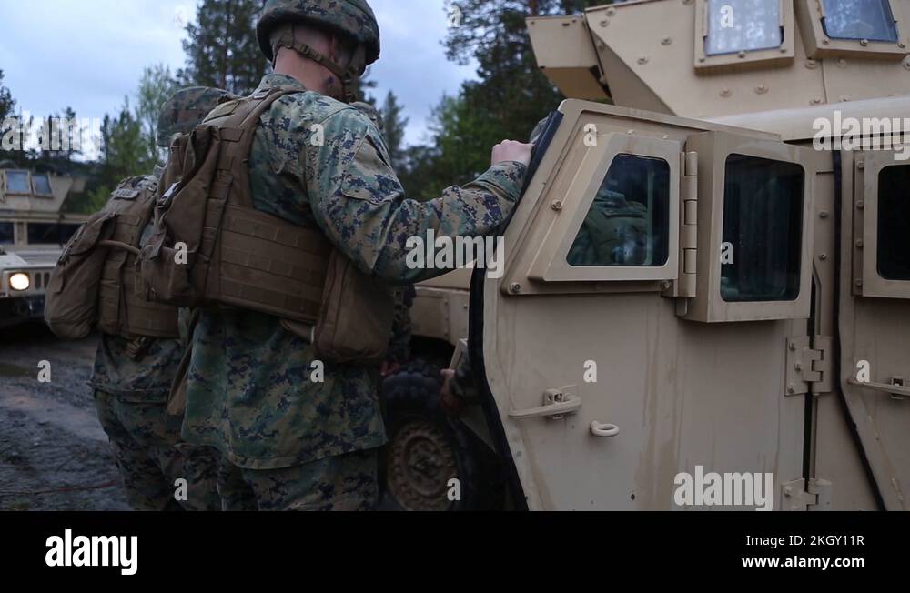 Soldiers load ammunition crate into armored vehicle Stock Video Footage ...