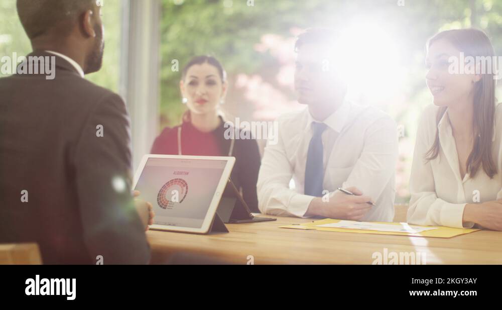 4K Businessman explains his work experience to management group at job ...