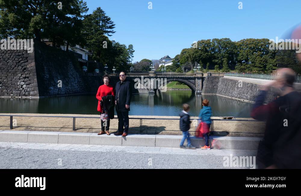 Crowd of tourists visit the Imperial Palace in Tokyo, 4K hyperlapse ...