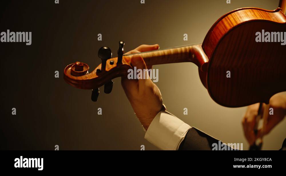 Experienced Violinist performing amazing solo on stage, spotted by ...