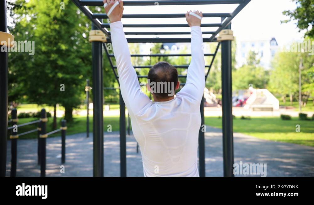 Man on hanging bars Stock Videos & Footage - HD and 4K Video Clips - Alamy