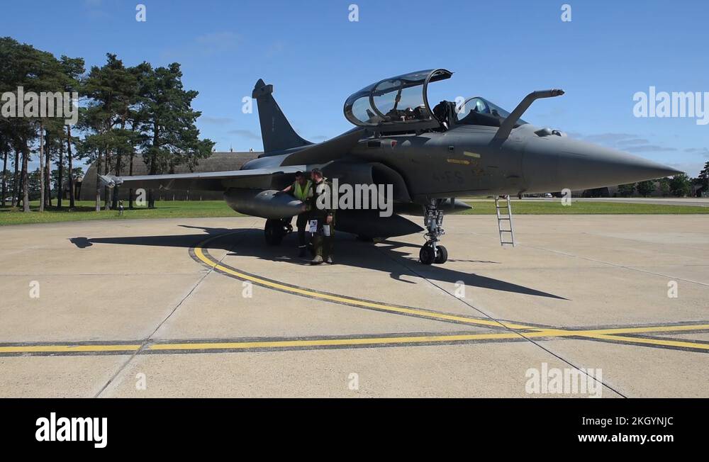 Dassault Rafale pilot and aircraft marshaller conduct pre-flight checks ...