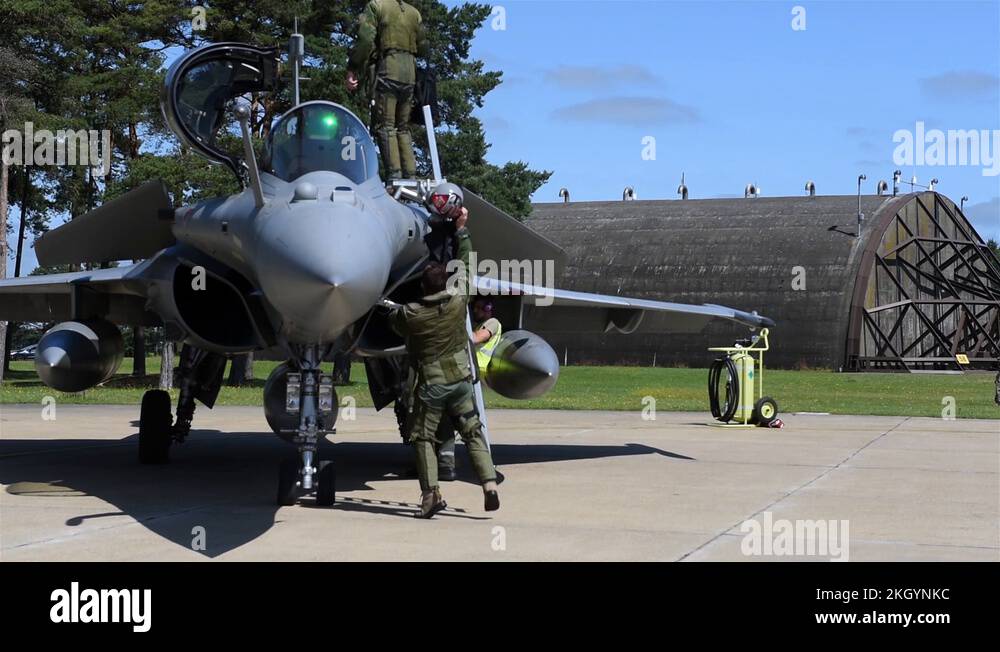 Fench Air Force Dassault Rafale pilot climbing cockpit ladder Stock ...