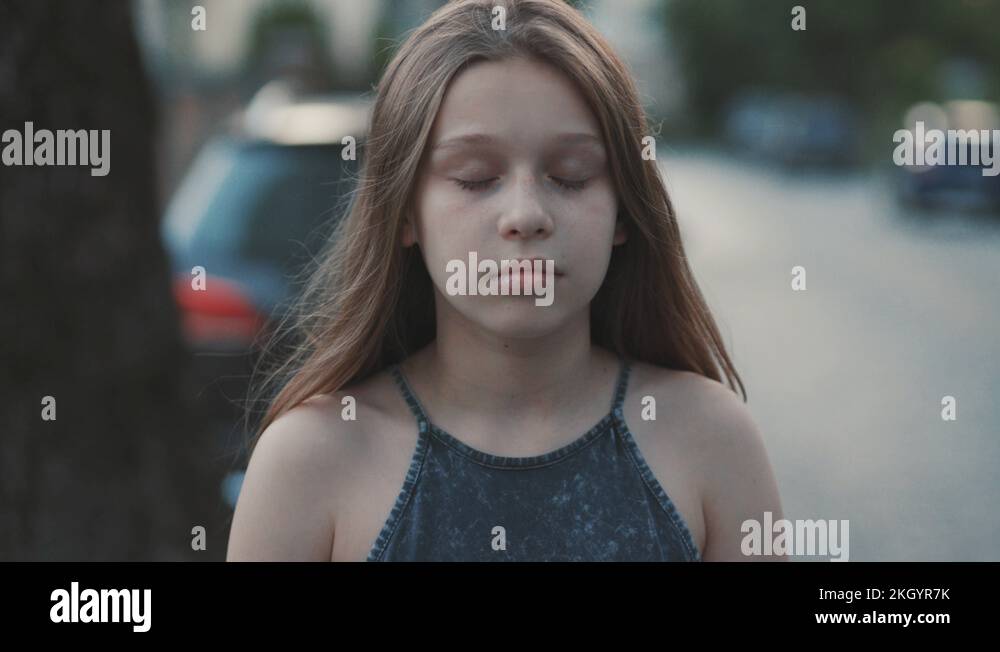 Relaxed little girl with closed eyes. Bad smell. Portrait of ...