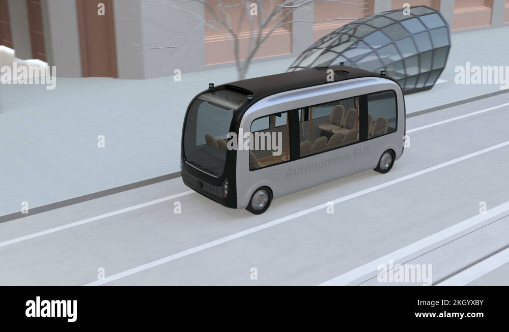 Self-driving shuttle bus driving through an intersection close to bus ...
