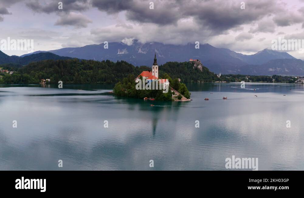 Lake Bled, Slovenia - 4K aerial speed up footage of flying towards Bled ...
