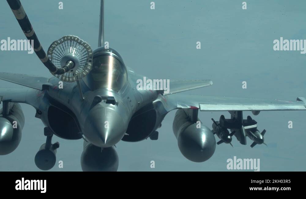 French Air Force Dassault Rafale connecting with drogue for air to air ...