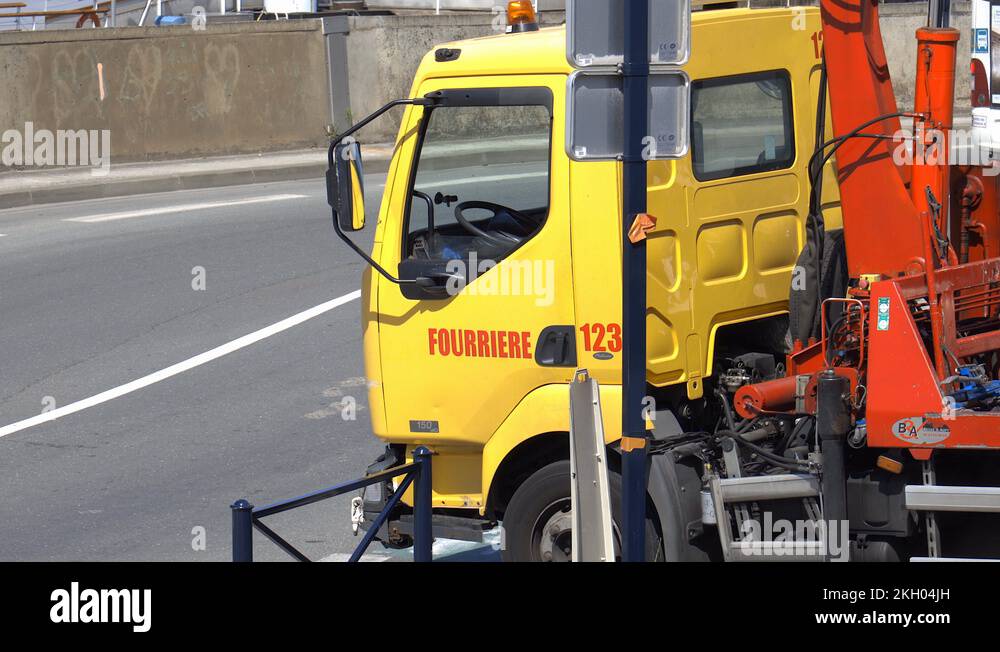 Cabin of an impounding truck with yellow lighted beacon, truck ...