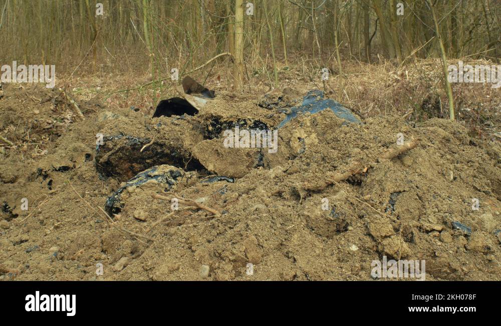 Toxic tar asphalt chemical till and clay. Former dump waste, effects ...