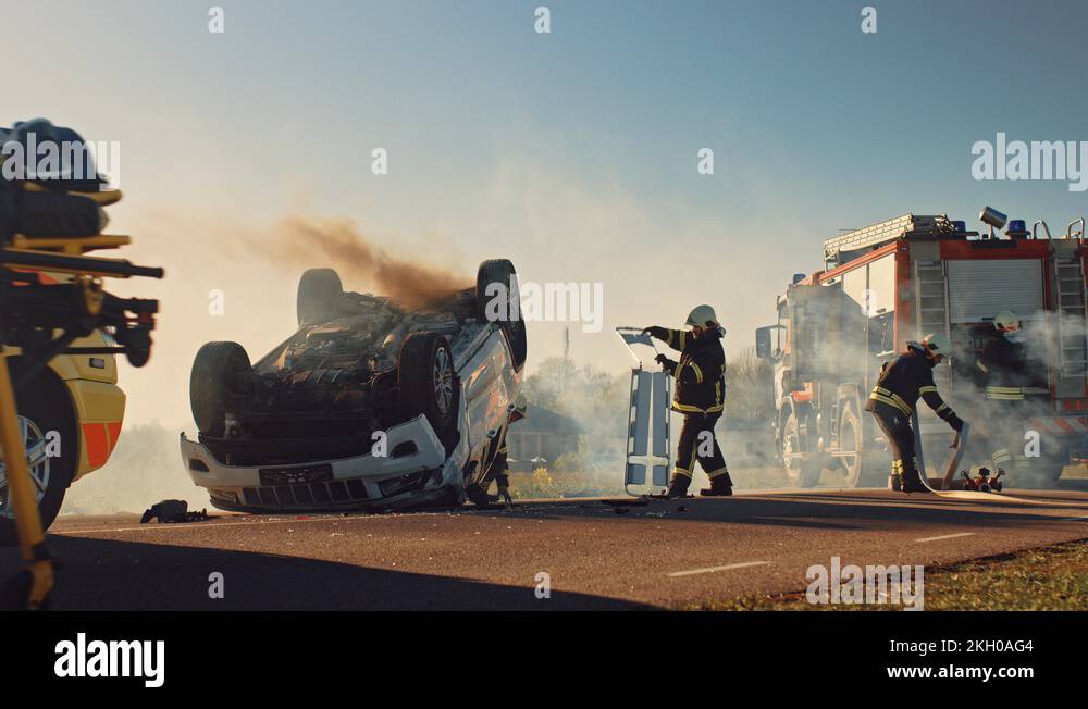 Paramedics and Firefighters Arrive On the Car Crash Traffic Accident ...