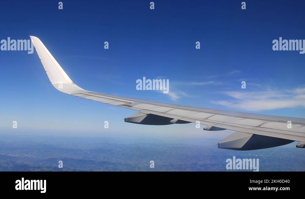 Window view from passenger seat on commercial airplane Stock Video ...