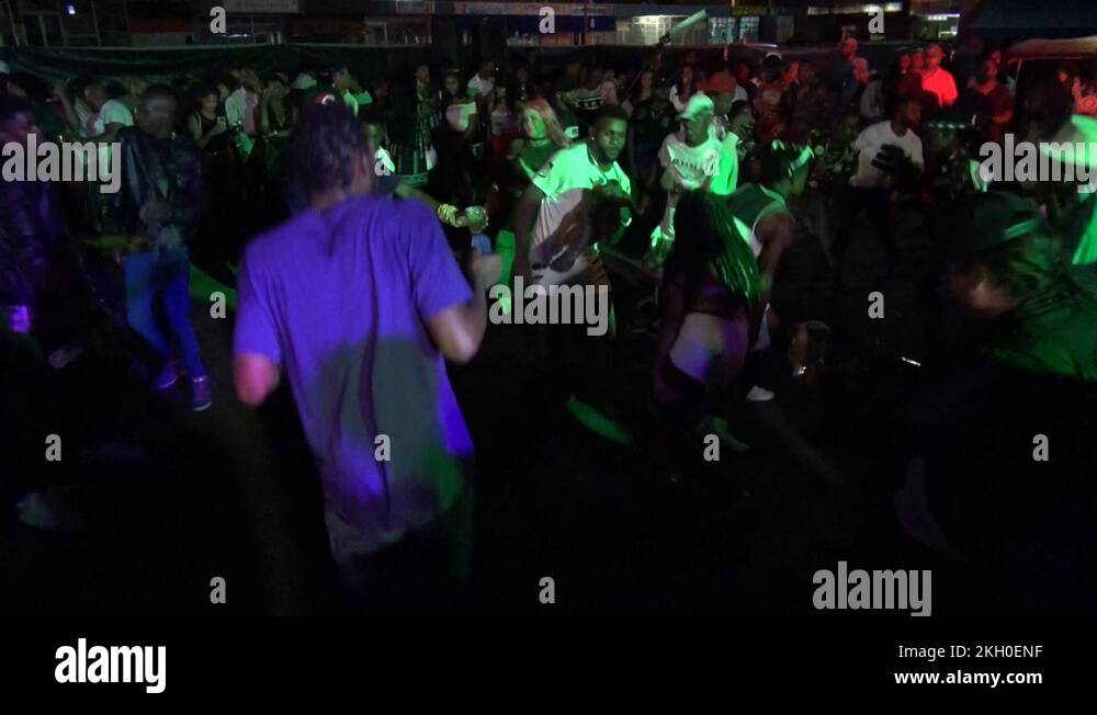 KINGSTON, JAMAICA : Scenery of outdoor street night club Stock Video ...