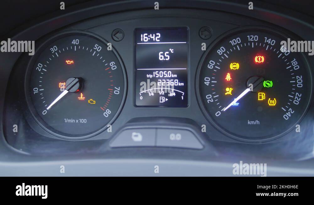 Car dashboard details with indication lamps, visible speedometer and ...