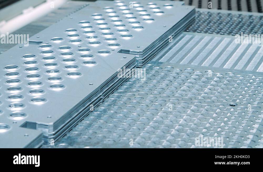 Metal sheets after stamping process kept in stock. Manufacturing ...