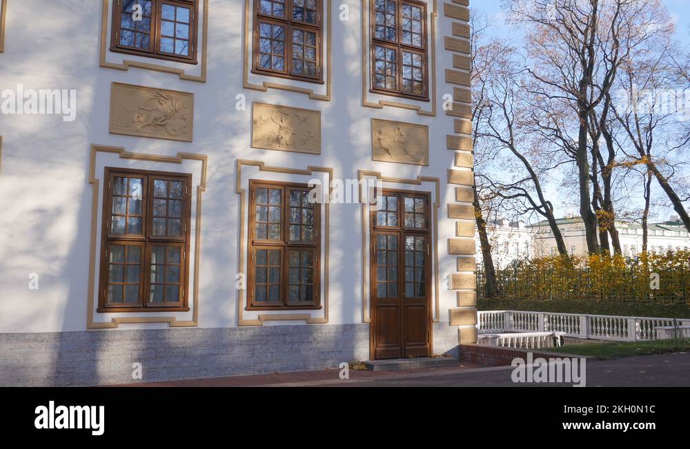 Cute old two-storey historically important building with wooden windows ...